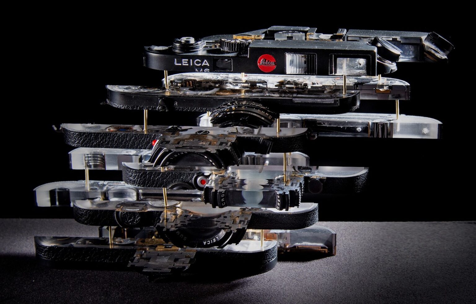 Fabian Oefner is creating art by cutting a Leica M6 camera into pieces ...